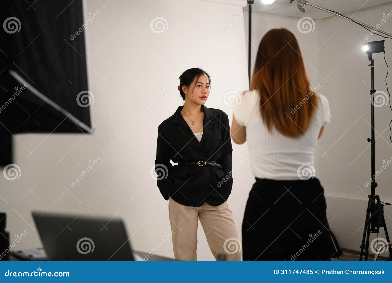 Elegant Young Female Model Posing for Professional Photographer in ...