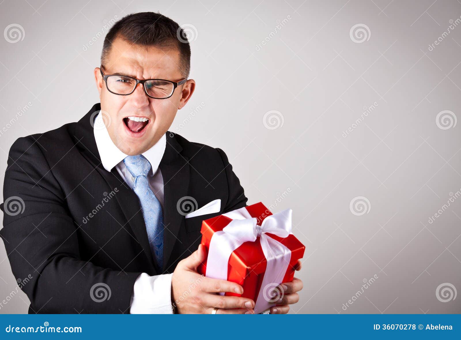 Elegant Young Man with Present Stock Photo - Image of decor, emotions ...