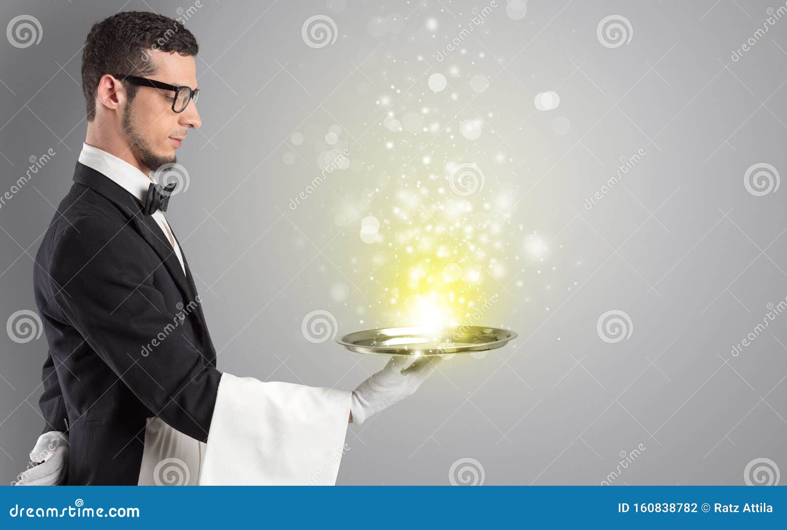 Waiter Serving Mysterious Light on Tray Stock Photo - Image of concept ...