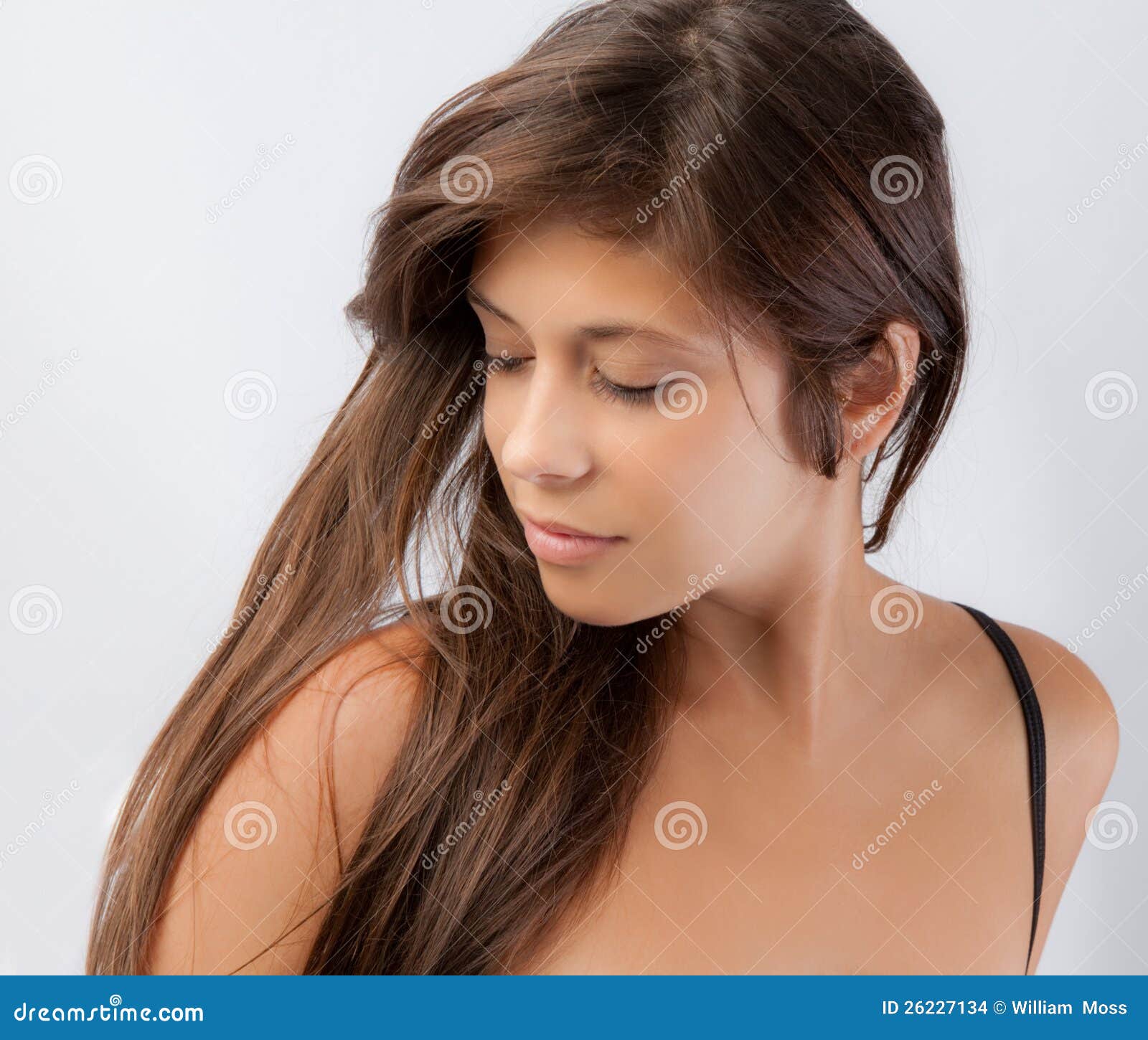 Elegant Young Woman Looking Downward Stock Photo - Image of cute, soft ...