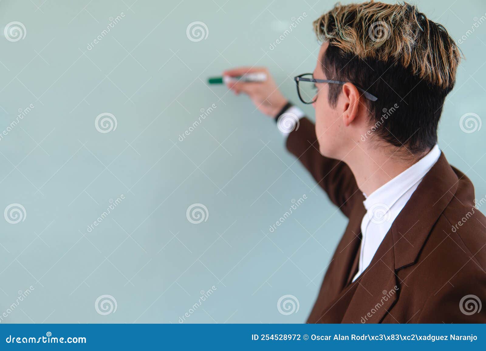 Elegantly Dressed University Professor Writing on the Whiteboard. Stock ...