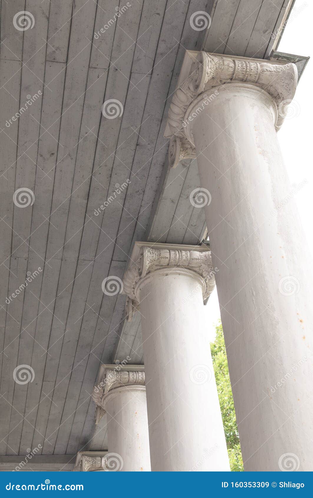 Element of an Old Column Against a Wood Ceiling. Vintage Element of ...