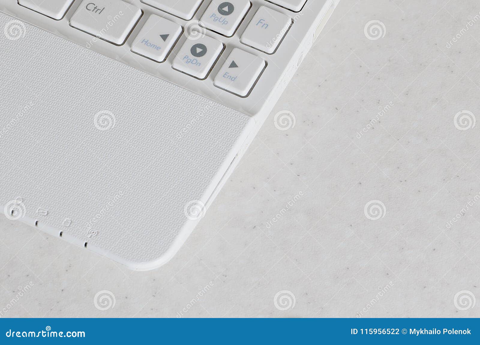 The Element of the White Compact Modern Netbook. Photo with a Fragment ...