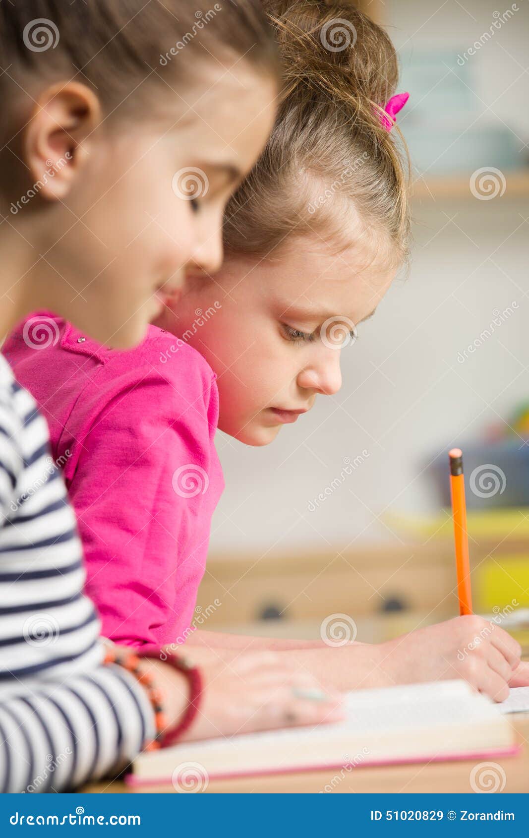 Elementary kids stock image. Image of female, lesson - 51020829
