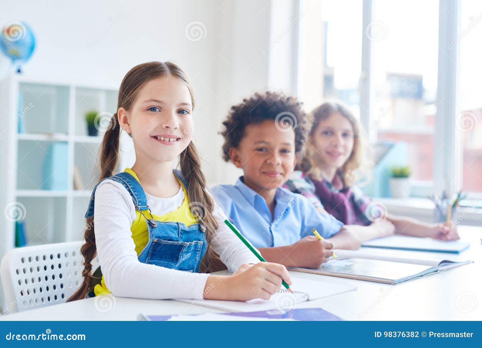 Elementary learners stock photo. Image of junior, diligent - 98376382