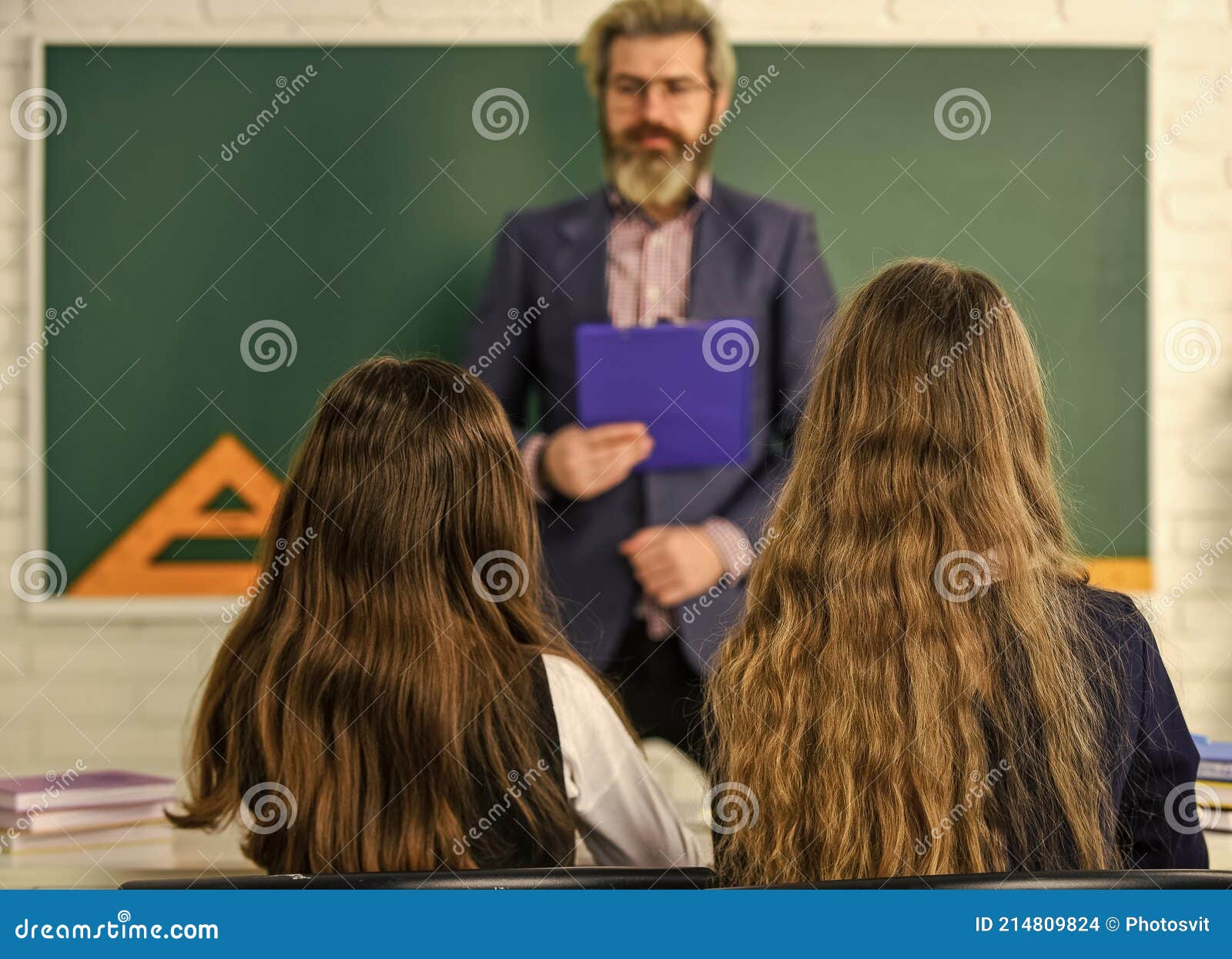 Elementary Pupil with Teacher in Classroom. Discussion Group of ...
