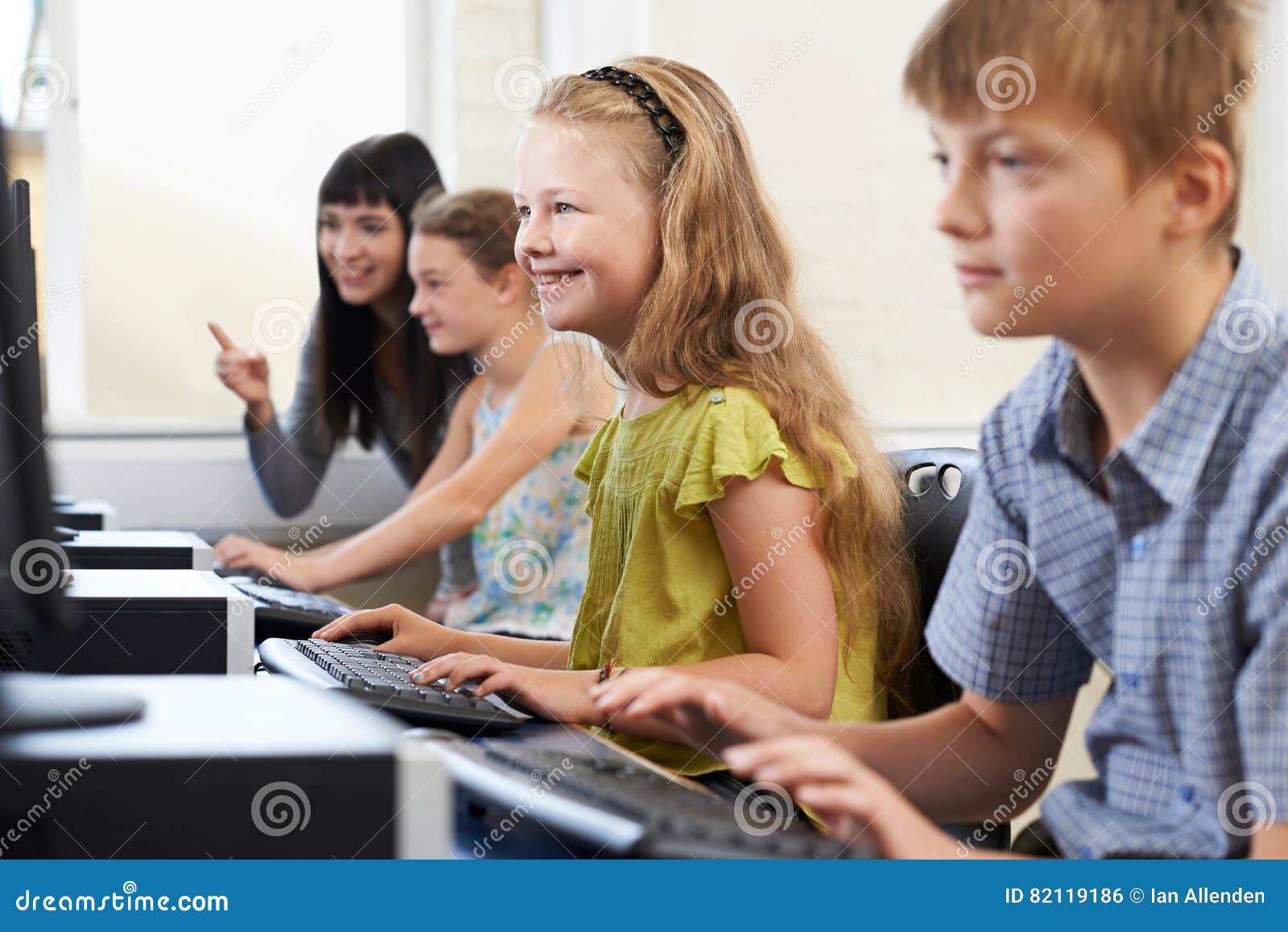 Elementary Pupils in Computer Class with Teacher Stock Photo - Image of ...