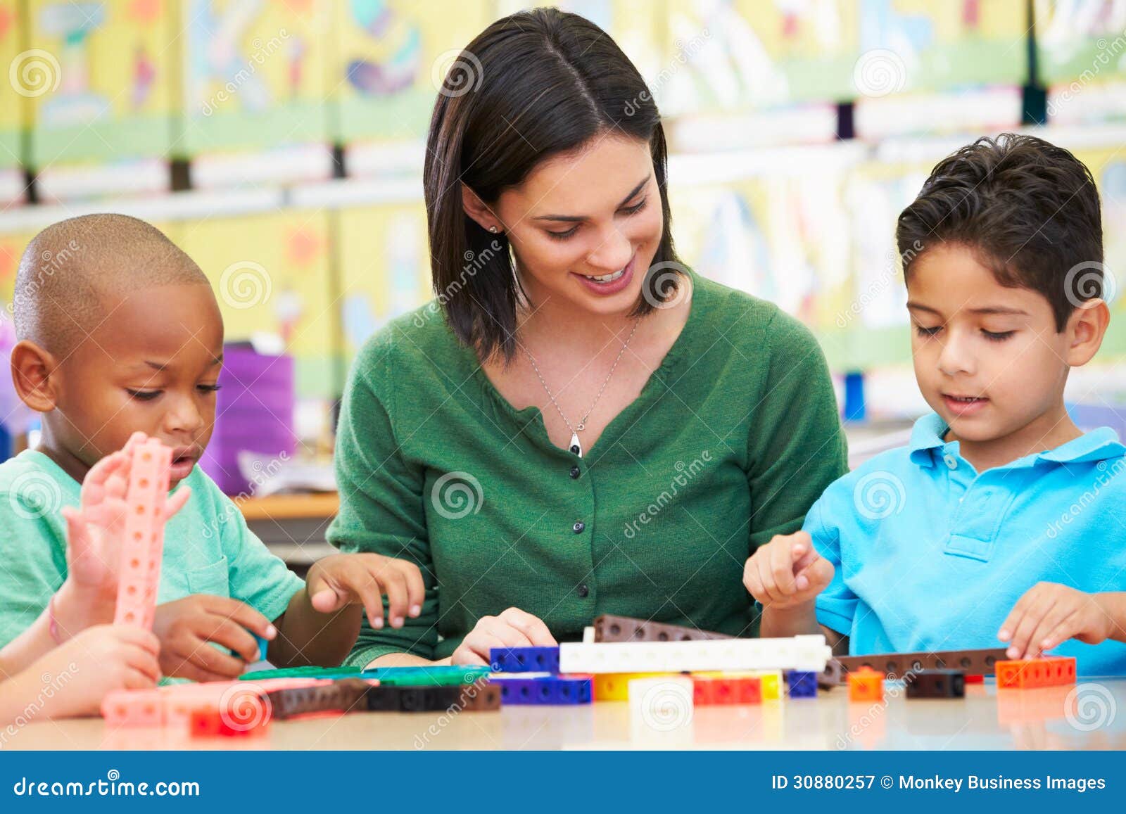 Elementary Pupils Counting with Teacher in Classroom Stock Image ...