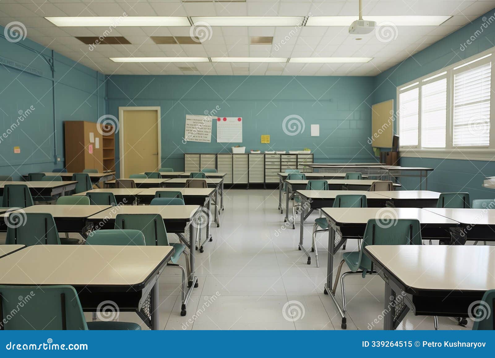 Elementary School Classroom Interior with Blue Wall and Projector ...