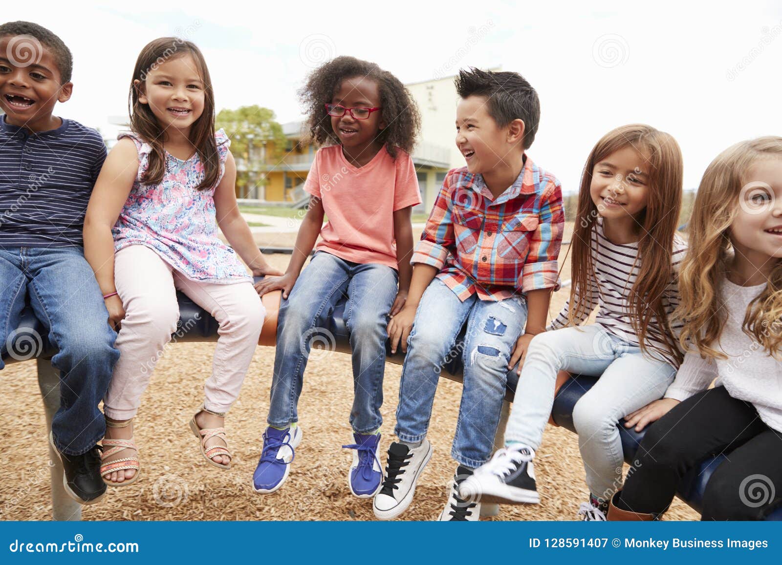 Elementary School Friends Sitting on a Spinning Carousel Stock Image ...
