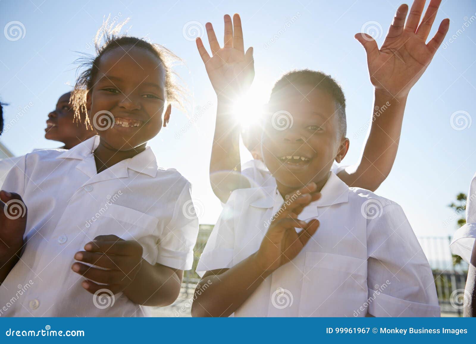 Elementary School Kids in Playground Waving To Camera Stock Image ...