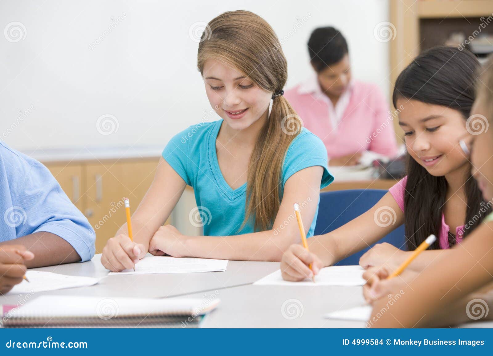 Elementary School Pupils in Classroom Stock Photo - Image of education ...