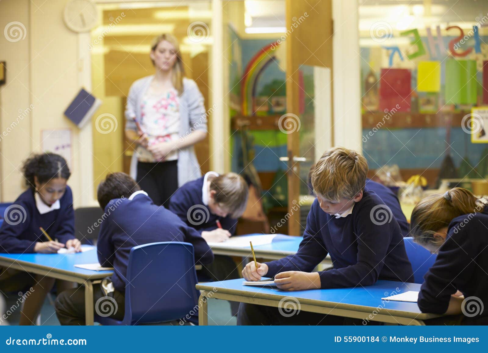 Elementary School Pupils Sitting Examination in Classroom Stock Photo ...