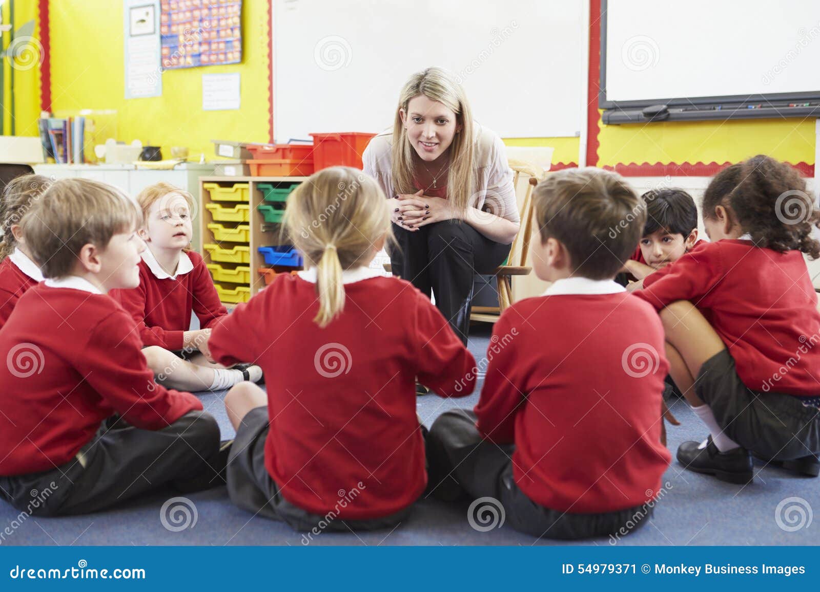 Elementary School Pupils Telling Story To Teacher Stock Image - Image ...