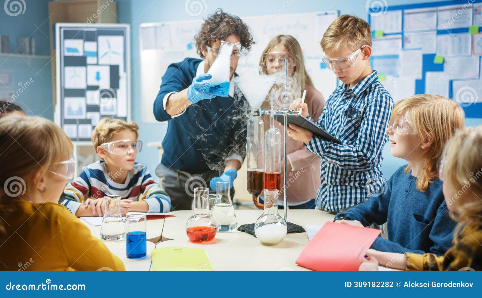 Elementary School Science Classroom: Enthusiastic Teacher Explains ...