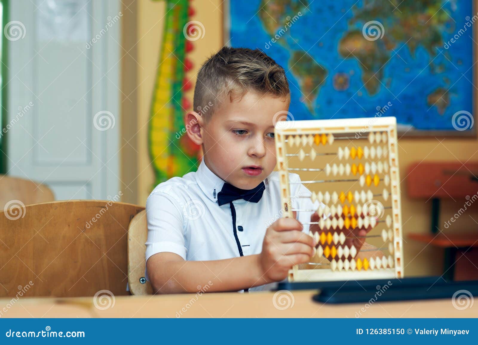 Elementary School Student with Bills Stock Photo - Image of student ...