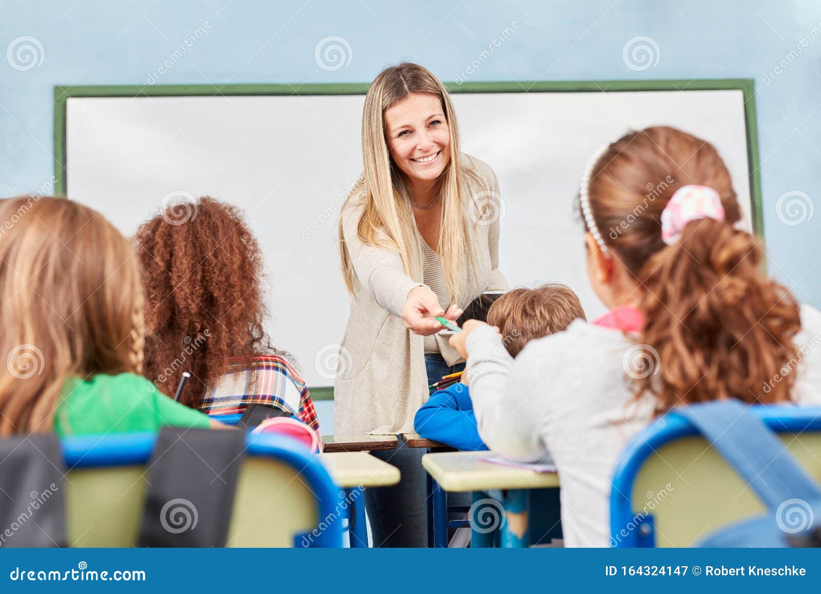 Elementary School Students in Class with Teacher Stock Image - Image of ...