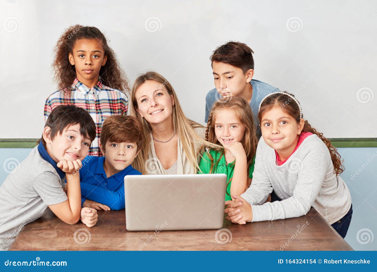 Elementary School Students at the Laptop PC Stock Photo - Image of ...