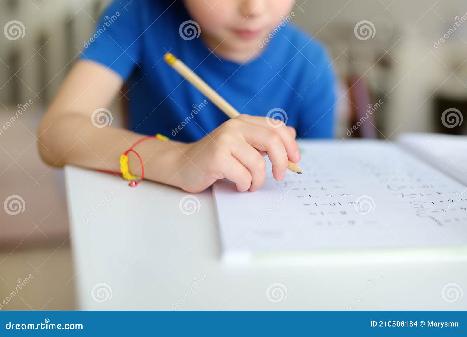 Elementary Student Boy Doing Homework at Home. Child Learning To Count ...