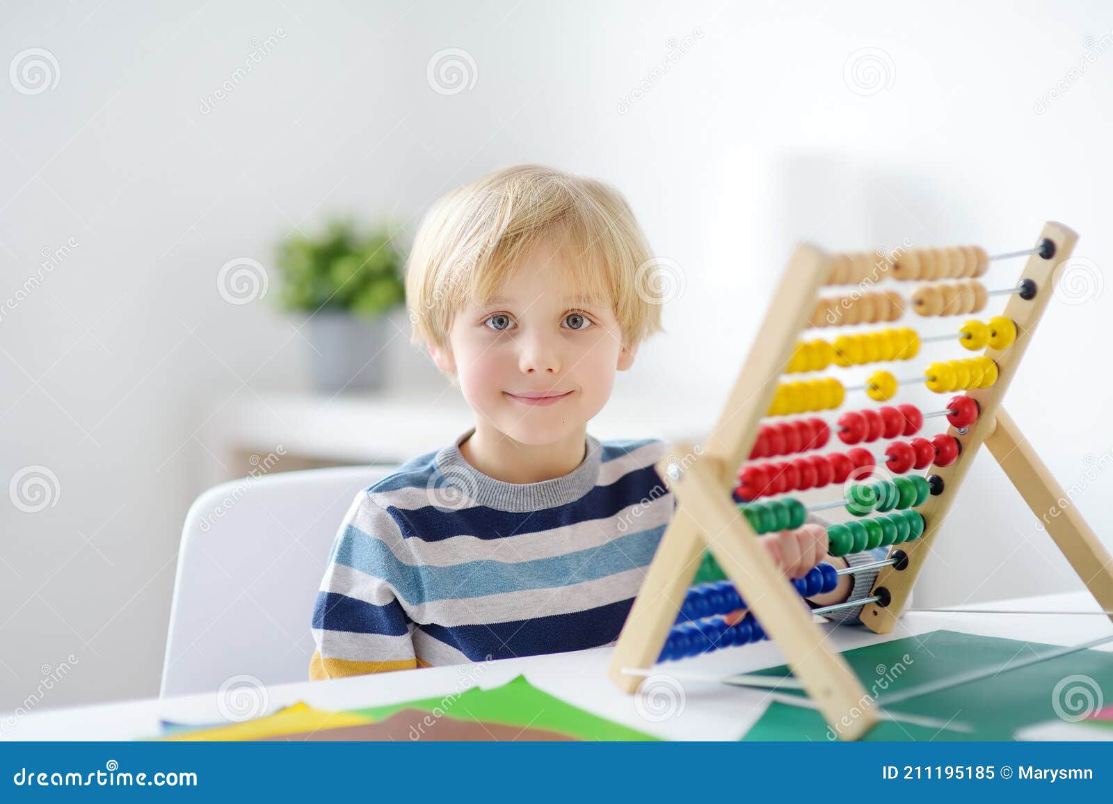 Elementary Student Boy Doing Homework at Home. Child Learning To Count ...
