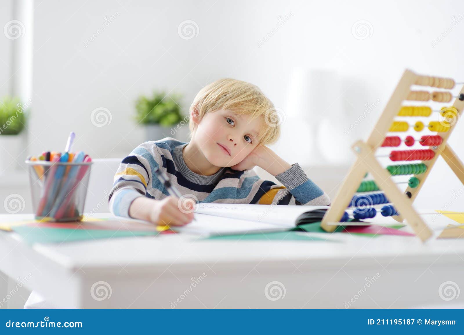 Elementary Student Boy Doing Homework at Home. Child Learning To Count ...