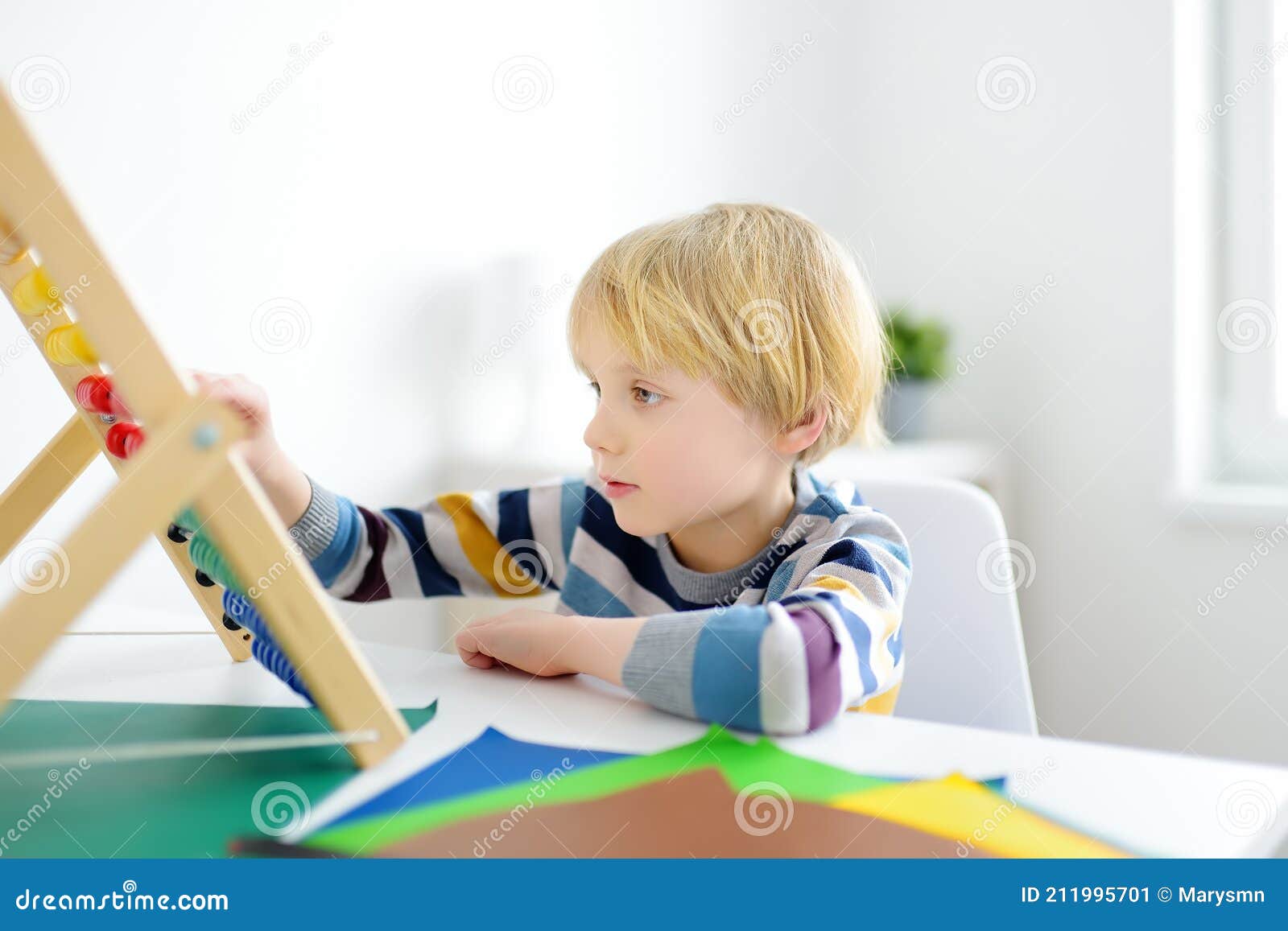 Elementary Student Boy Doing Homework at Home. Child Learning To Count ...