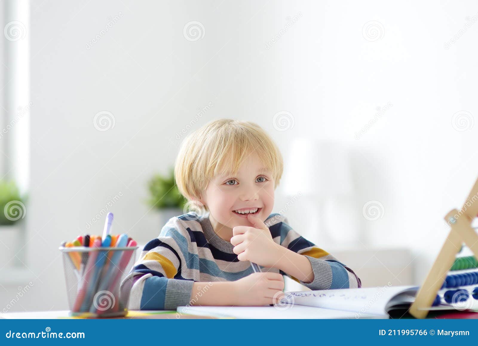 Elementary Student Boy Doing Homework at Home. Child Learning To Count ...