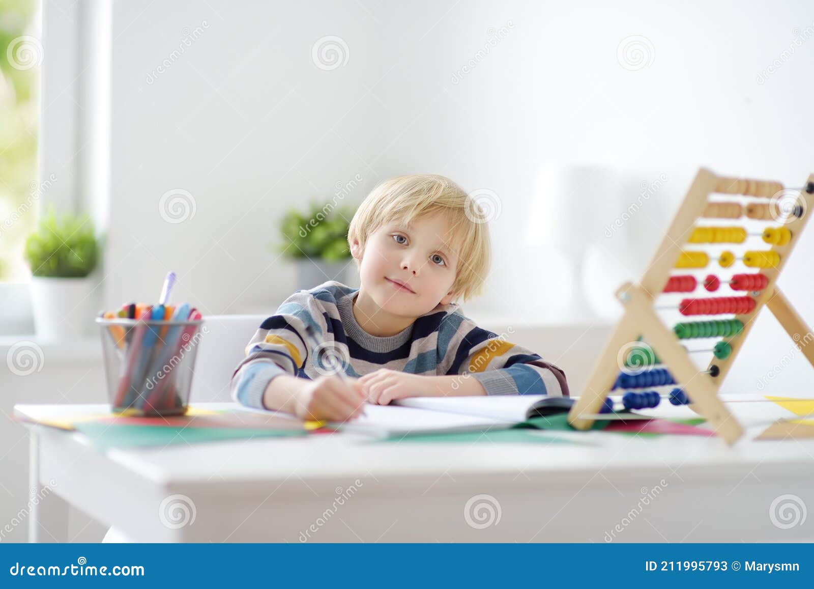 Elementary Student Boy Doing Homework at Home. Child Learning To Count ...