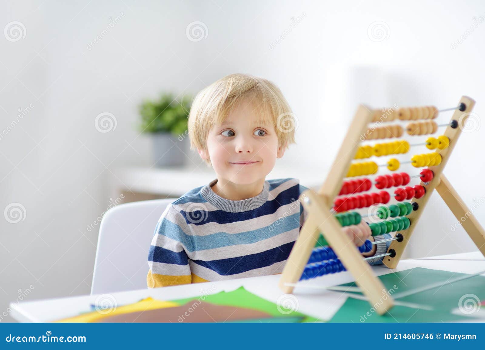 Elementary Student Boy Doing Homework at Home. Child Learning To Count ...