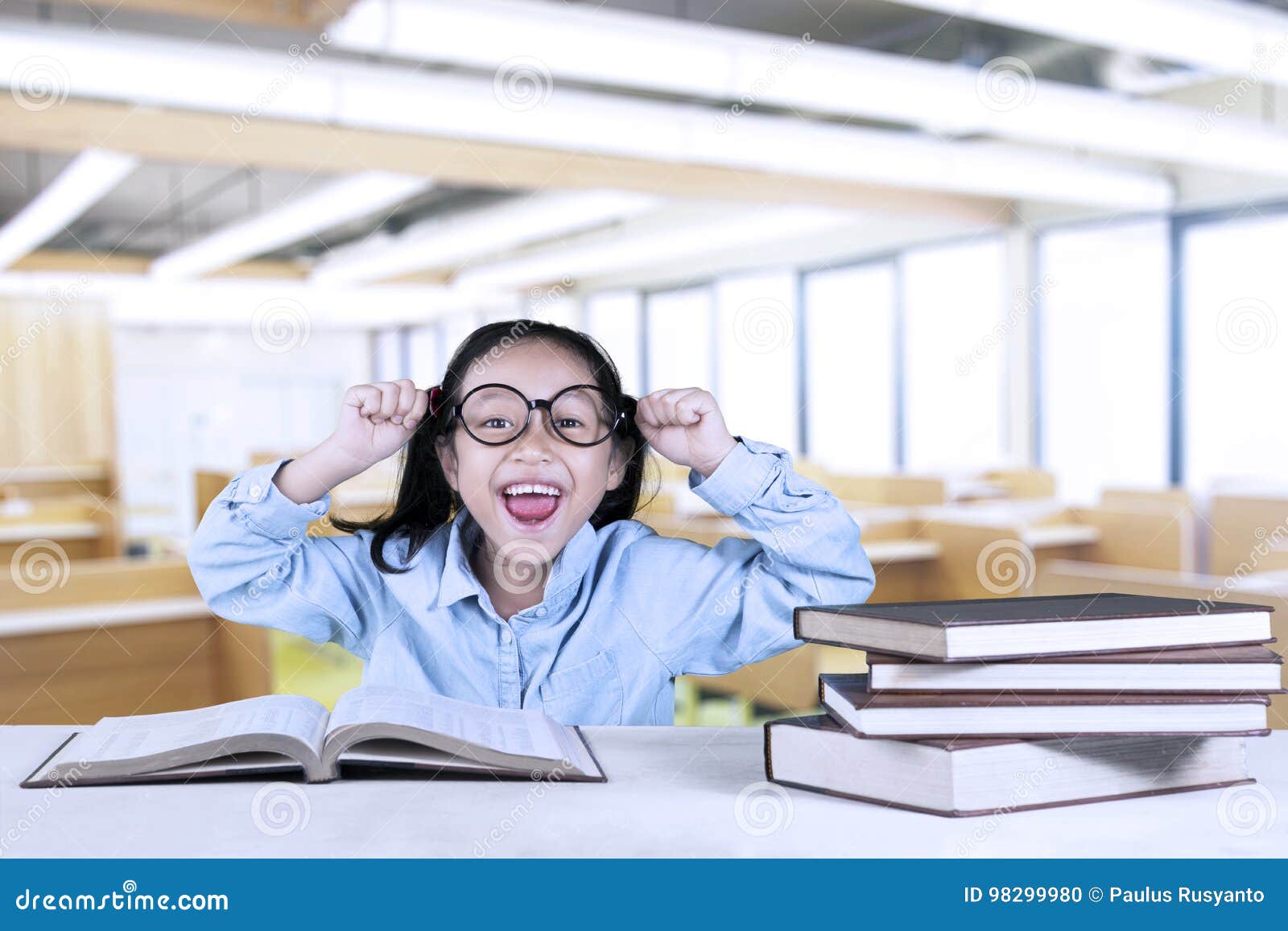 Elementary Student Celebrating Her Success in Classroom Stock Photo ...