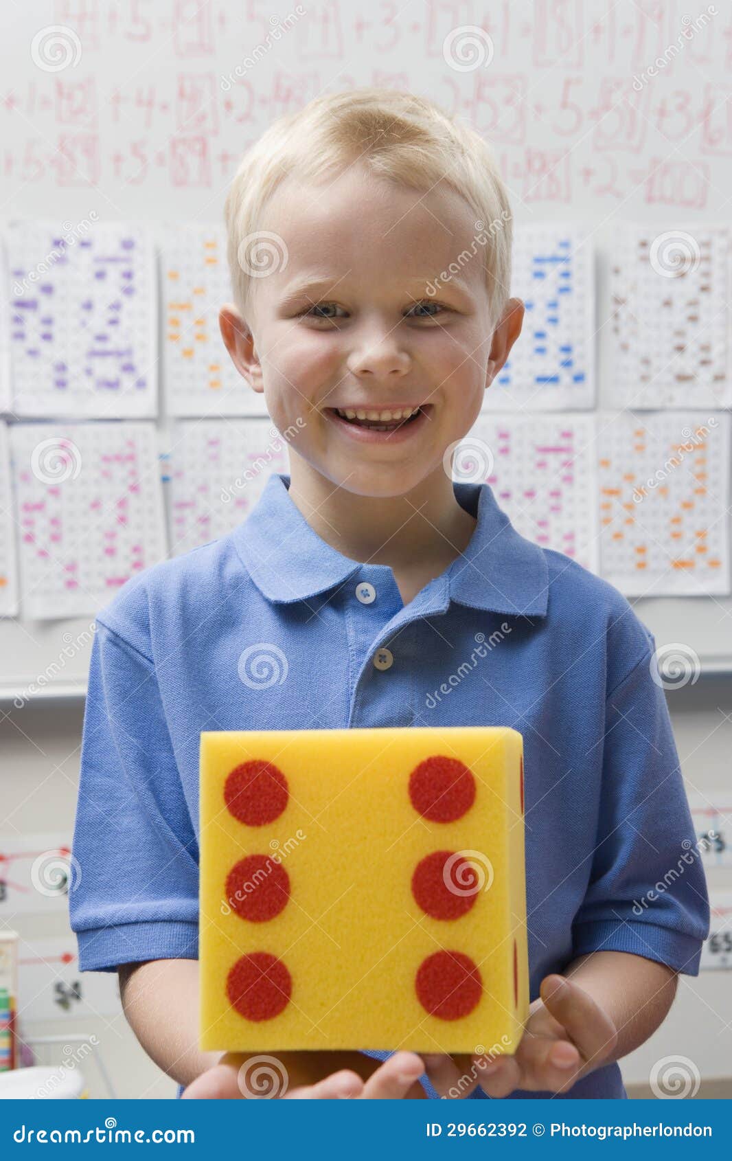 Elementary Student with Large Dice Stock Photo - Image of blue ...