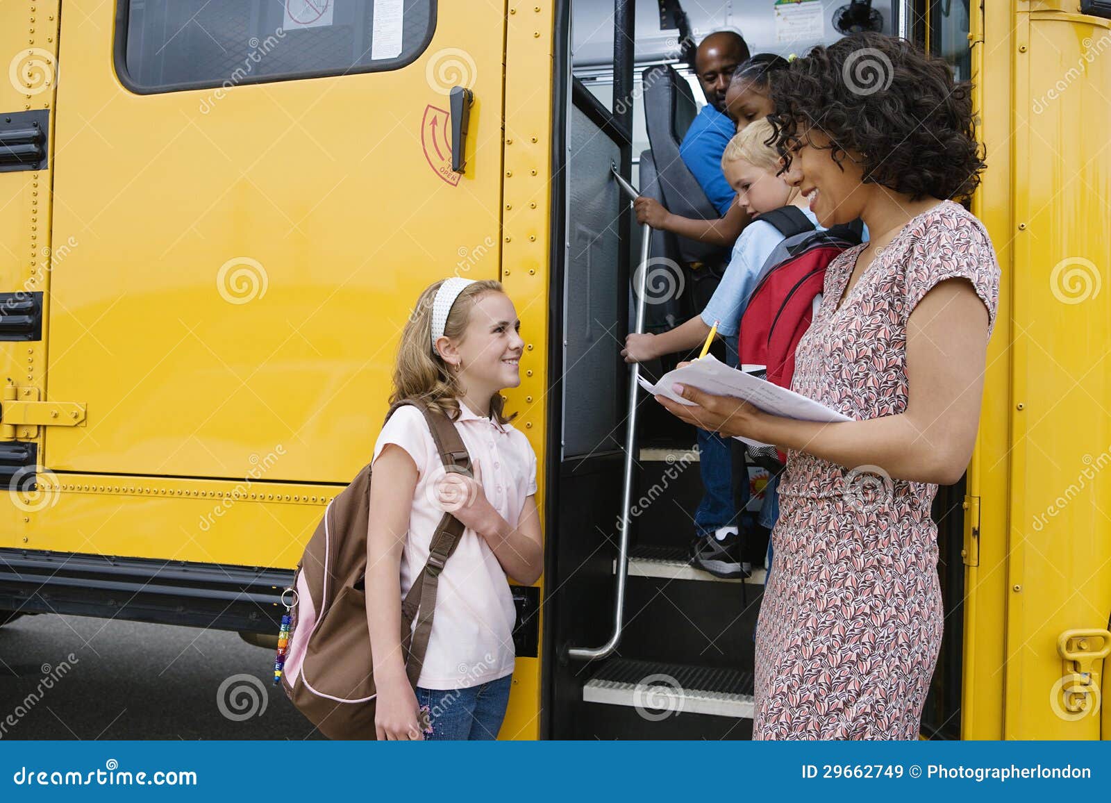 Elementary Students Boarding School Bus Stock Image - Image of happy ...