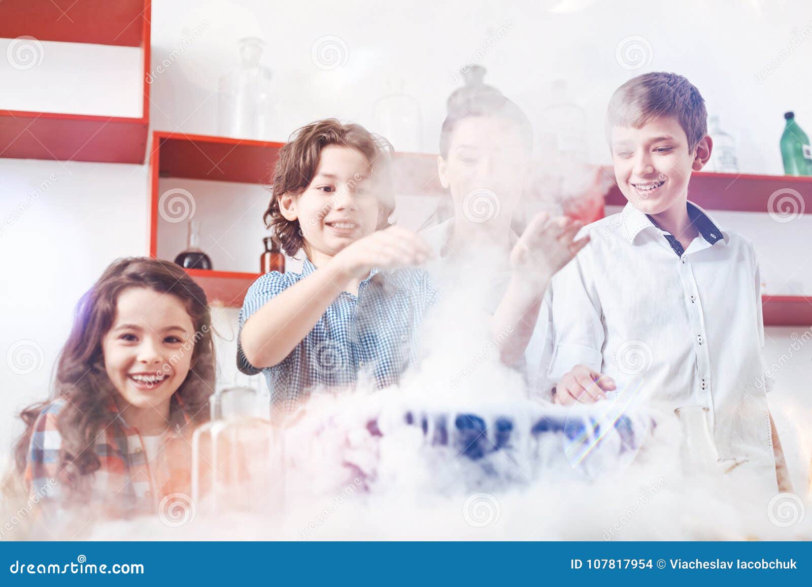 Elementary Students Conducting Experiment in Science Classroom Stock ...