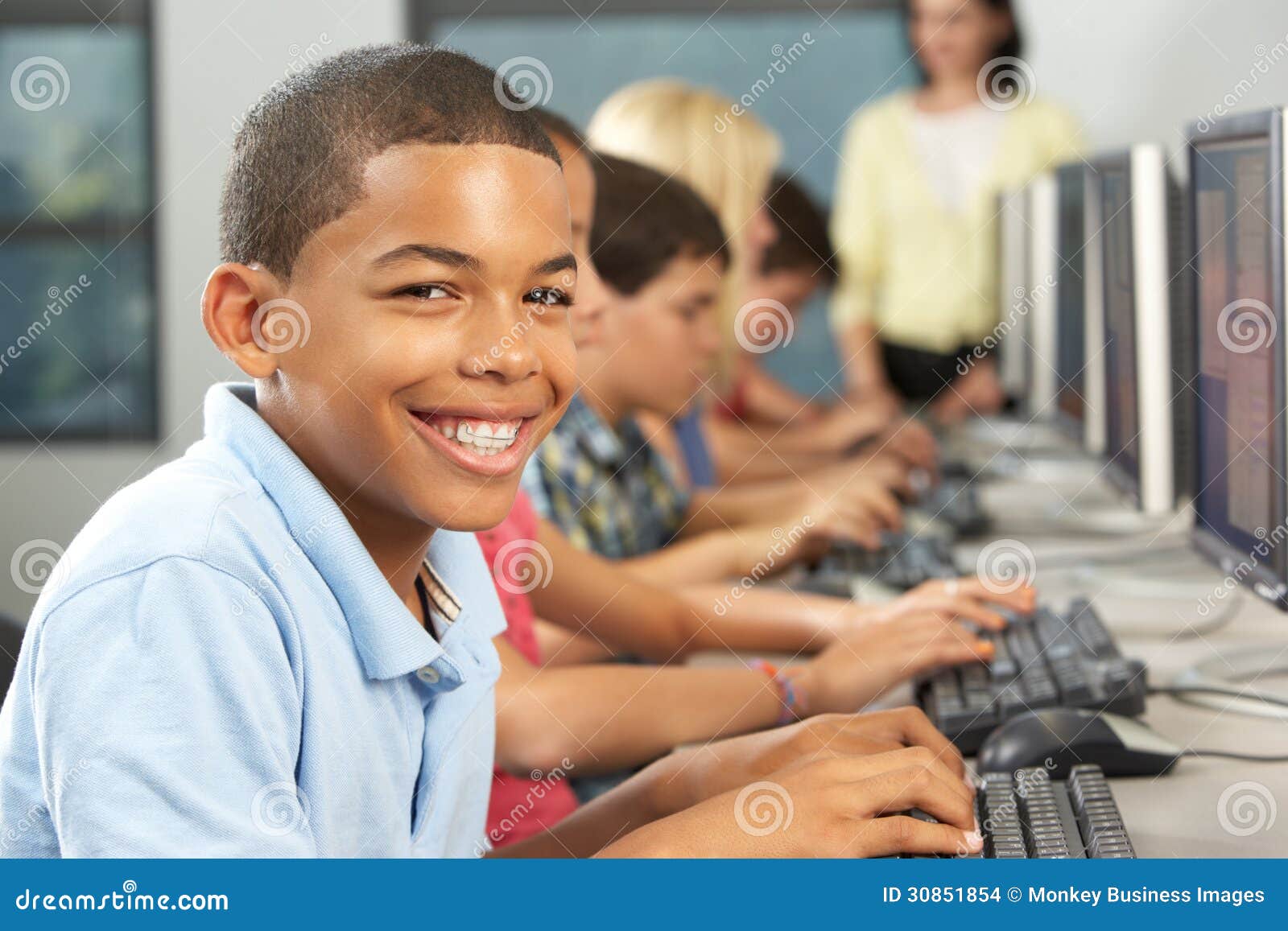 Elementary Students Working At Computers In Classroom Stock Images ... Elementary Students Working At Computers In Classroom Stock Images ...