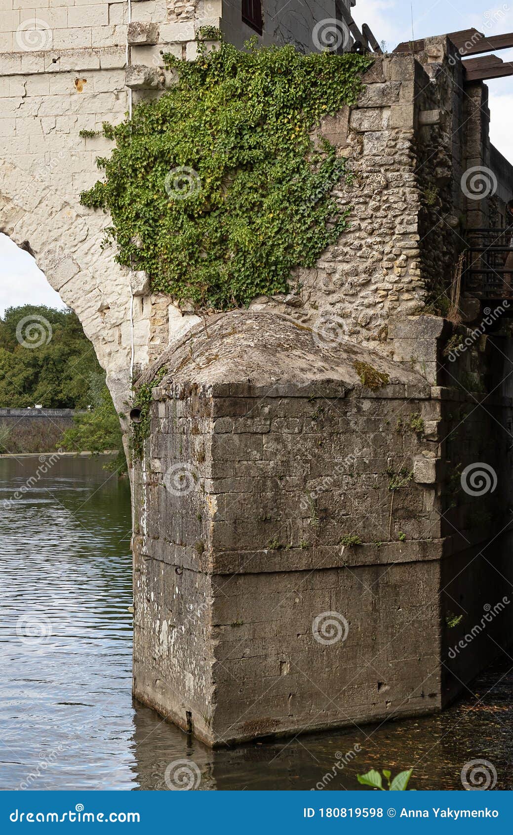 Elements of an Ancient Cobblestone Bridge Over a River Stock Photo ...
