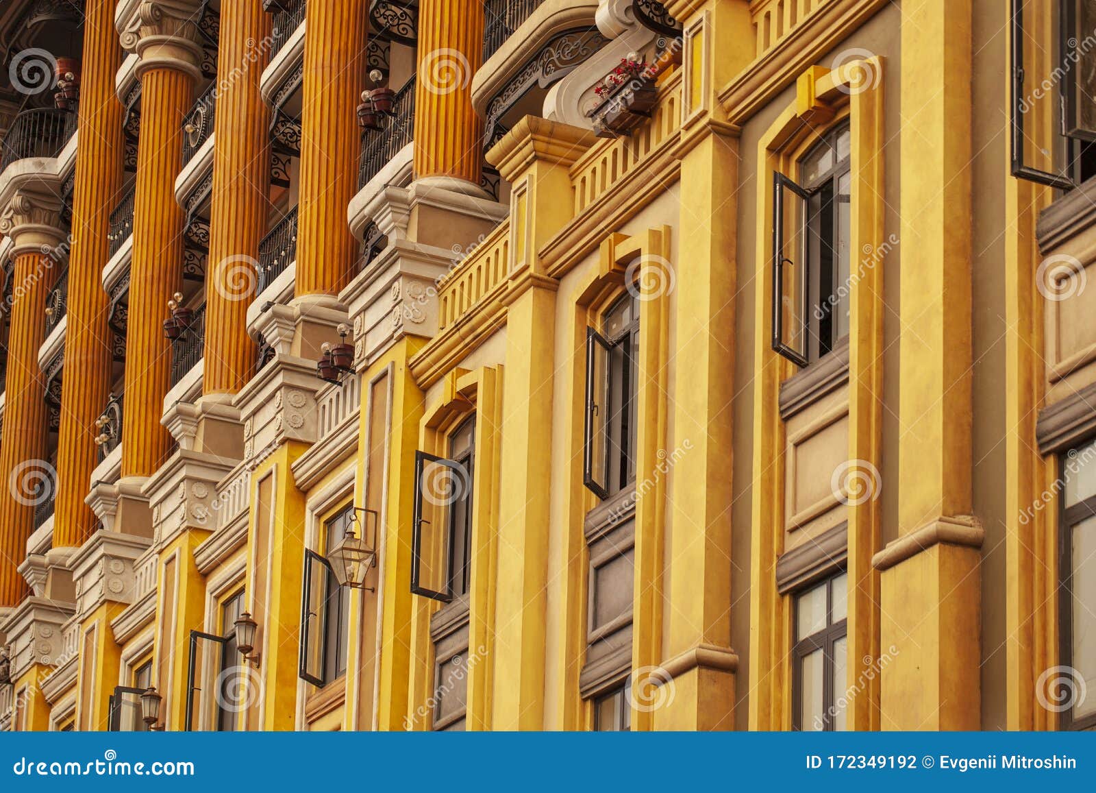 Elements of Architecture, Building Facade with Yellow Columns Stock ...