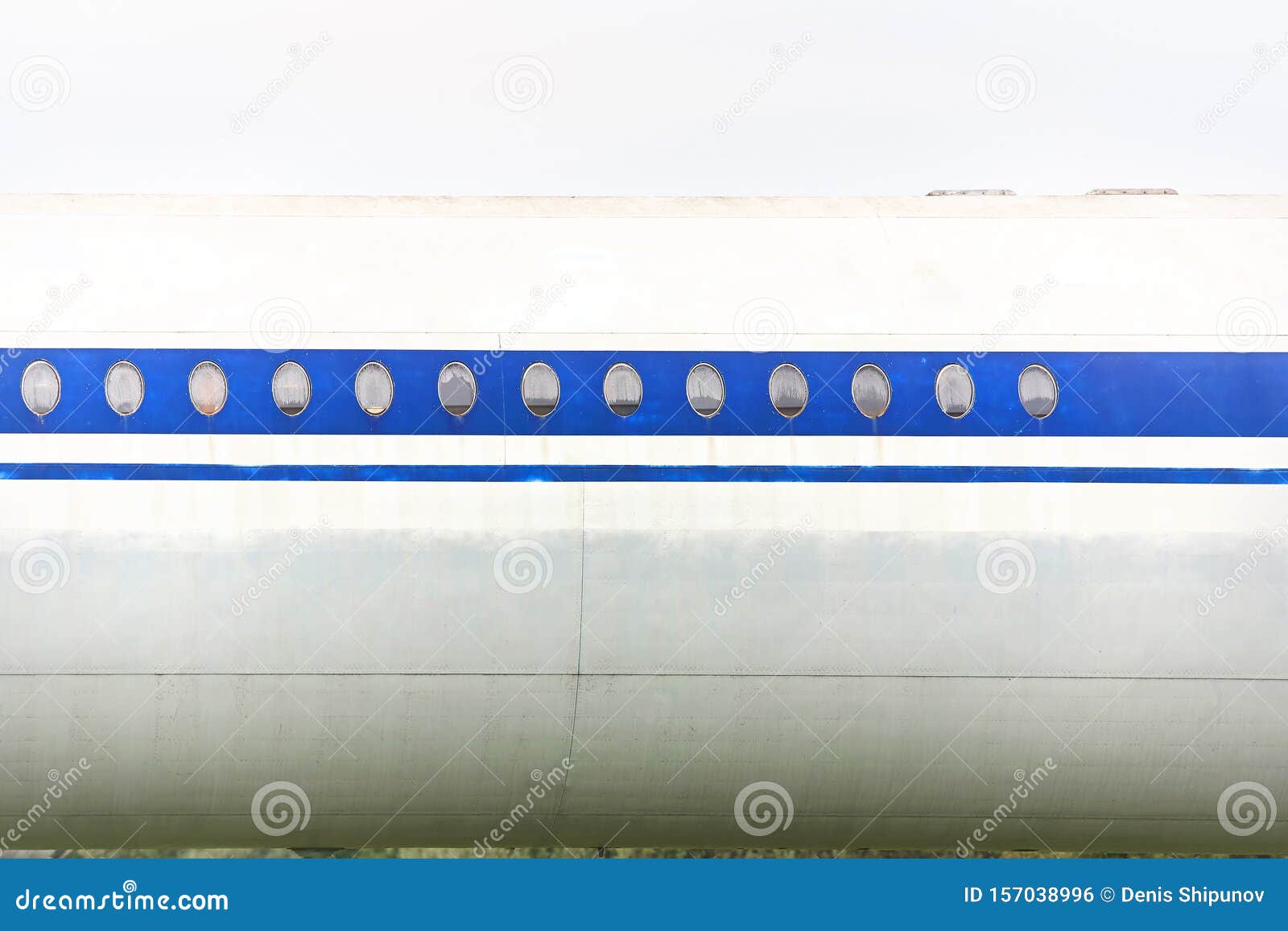Elements of a Passenger Plane with a Blue Stripe Closeup Stock Photo ...