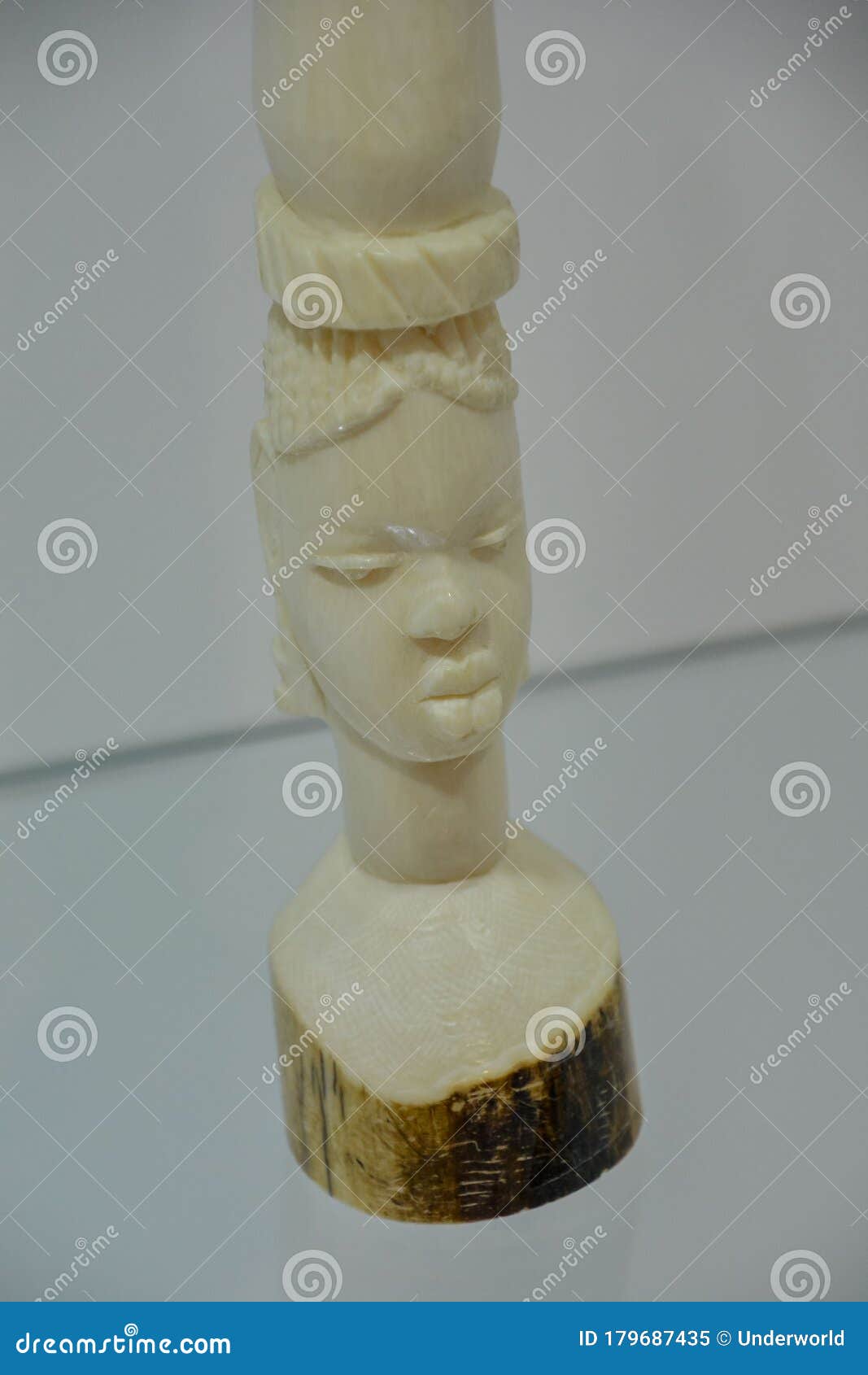 Elephant Ivory Craved Model Of Sitting Emperor Isolated On White ...