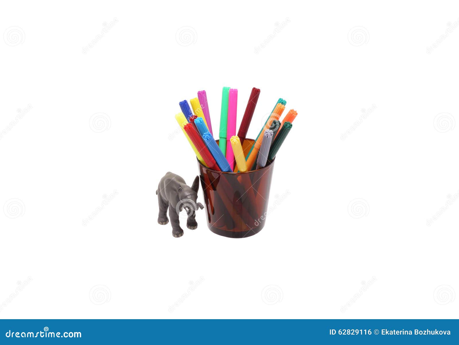 Elephant Toy and Colored Pencils in a Glass. Stock Photo - Image of ...