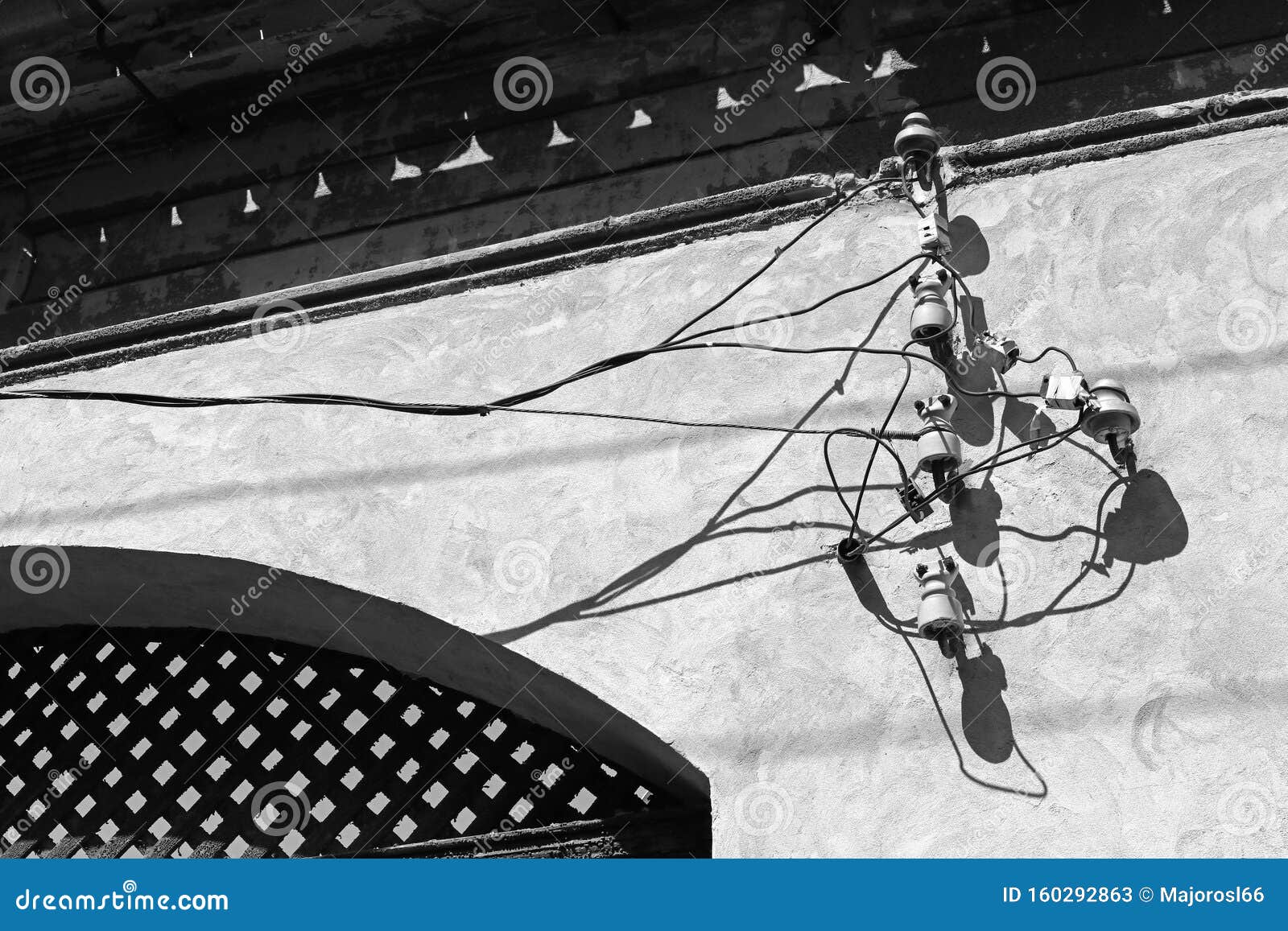 Eletcticity Cables and Telephone Lines on the Wall Stock Image - Image ...