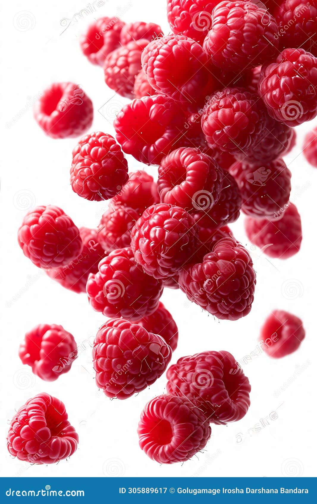 "Captivating Motion: Falling Raspberry Isolated on White Background ...
