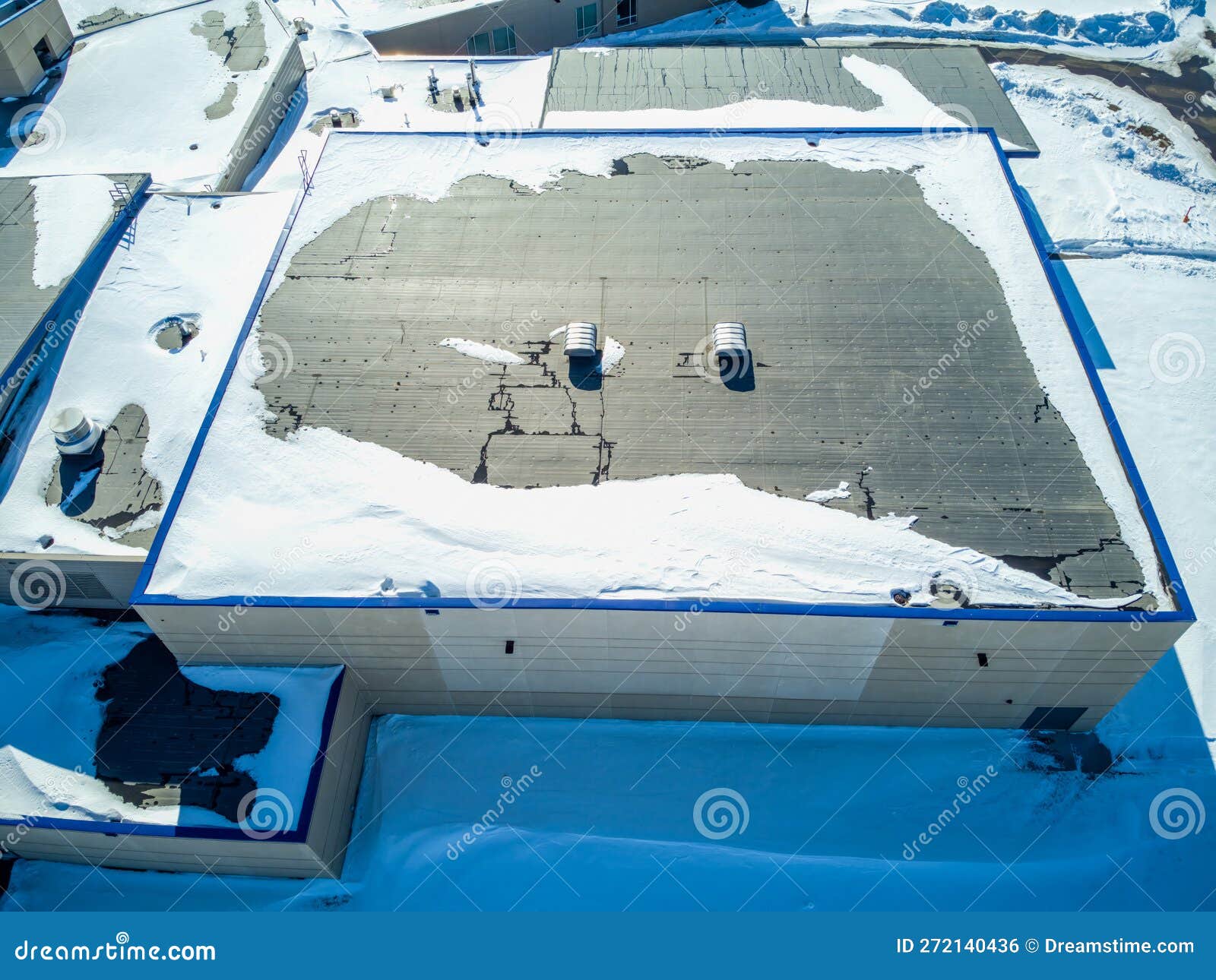 Elevated Overhead Drone View of a Flat Roofed Building with Snow Load ...