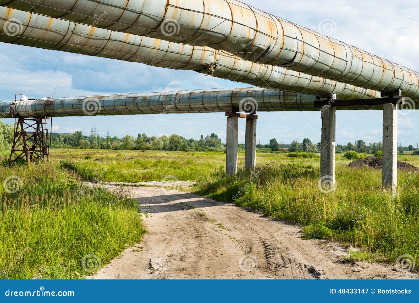 Elevated Section of the Pipelines Above the Dirt Road Stock Image ...