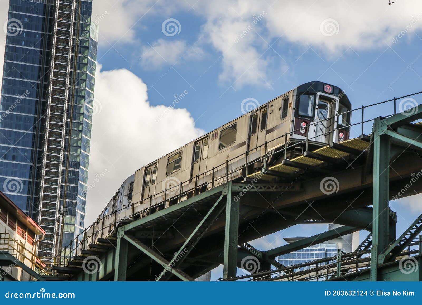 Elevated train in New York stock photo. Image of blue - 203632124