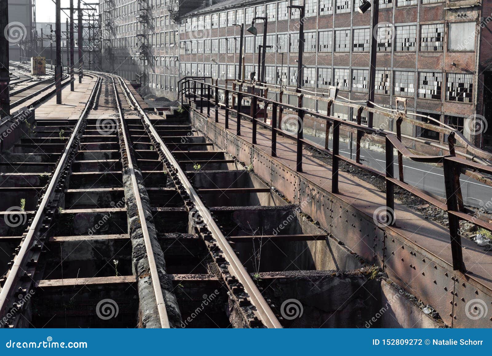 Elevated Train Tracks Running Alongside and Abandoned Industrial ...