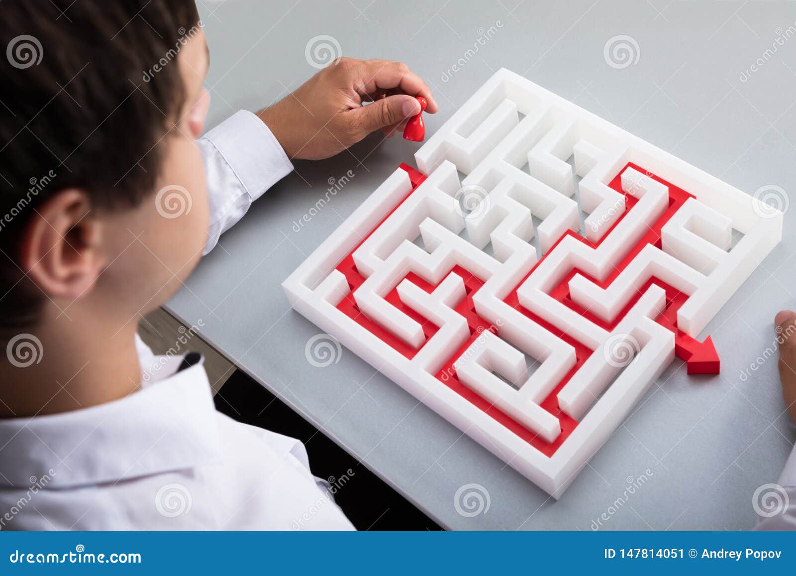 Businessman solving maze stock image. Image of complexity - 147814051