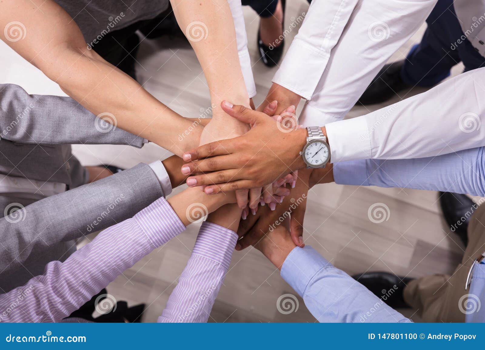 Elevated View of Businesspeople Stacking Hands Stock Photo - Image of ...