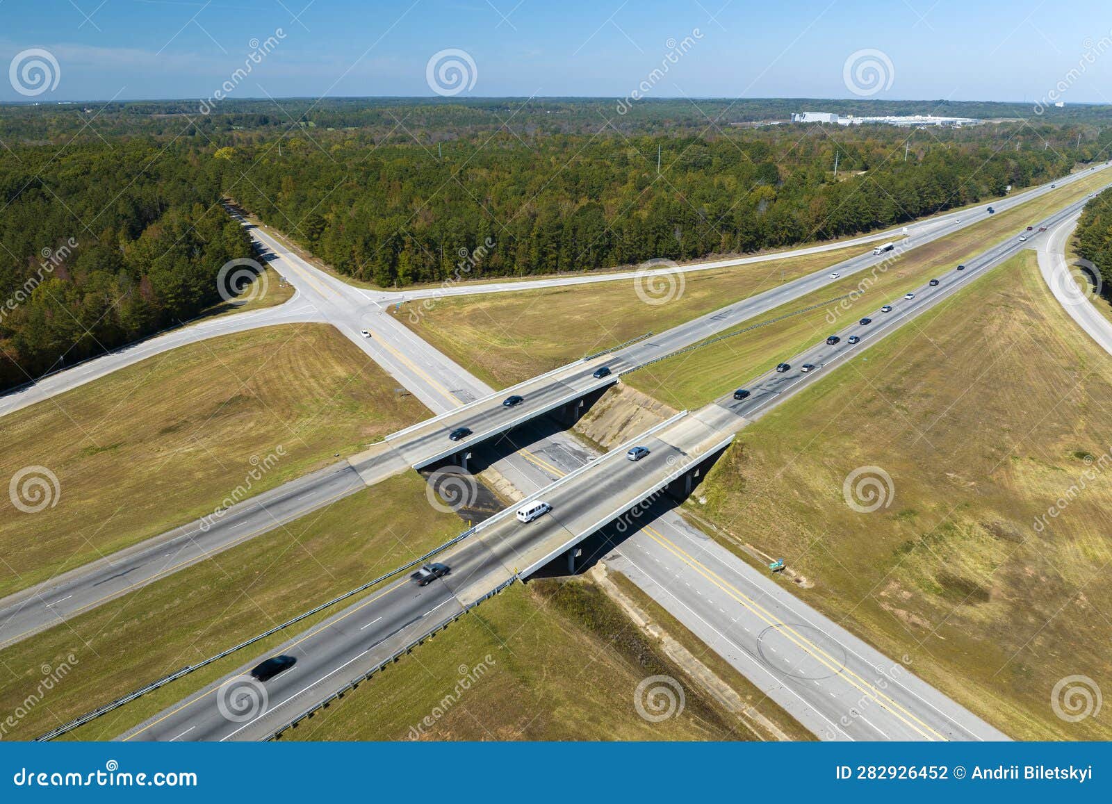Elevated View of Freeway Exit Junction Over Road Lanes with Fast Moving ...