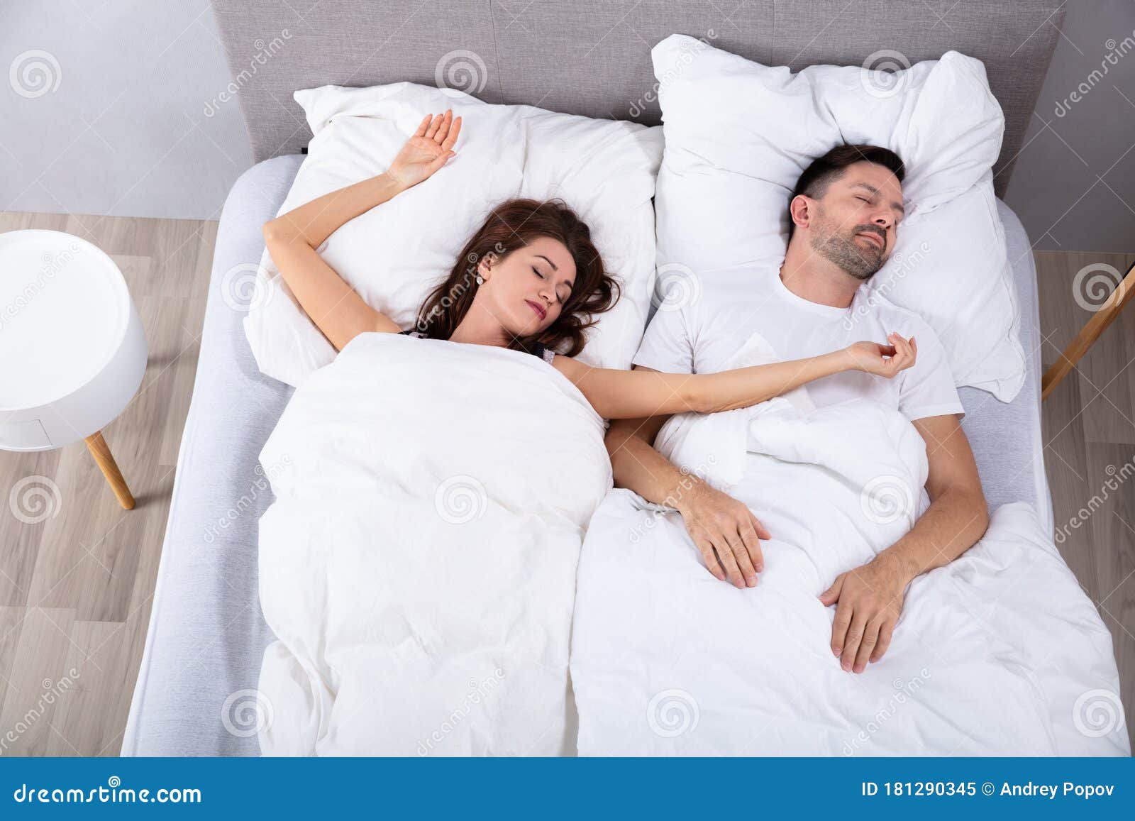 Married Couple Napping on Bed Stock Image - Image of positions, indoors ...
