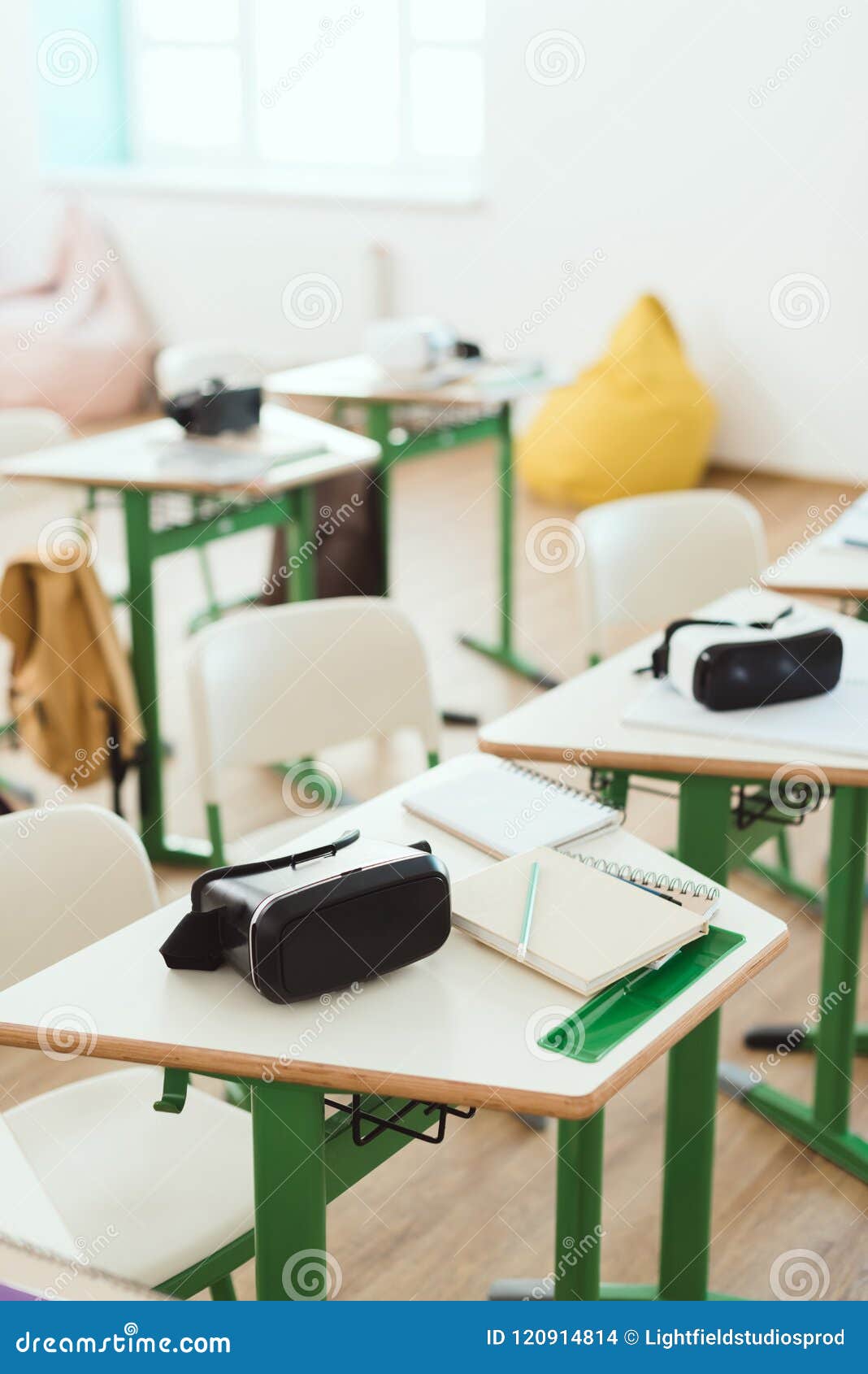 Elevated View of Virtual Reality Headsets on Tables Stock Photo - Image ...